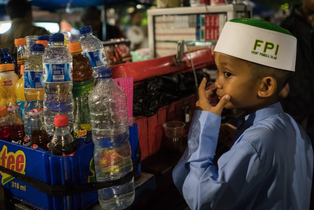 Between inequality and identity in Jakarta polls - New Mandala