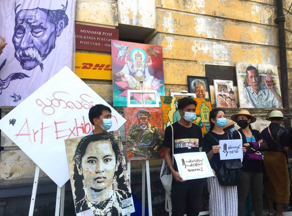 16. Artists selling portraits of generations of resistance leaders in ...